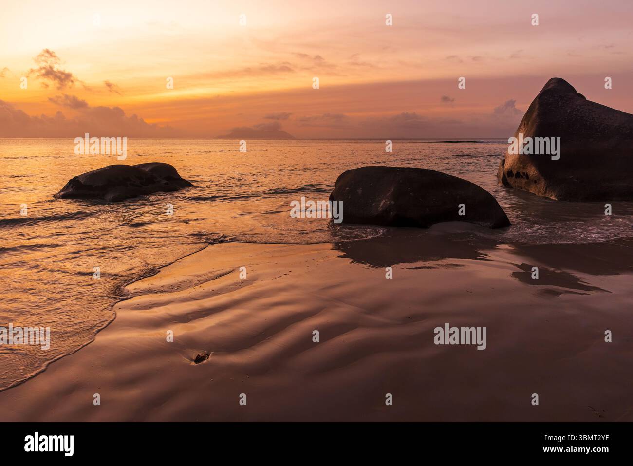 Coastal landscape of Mahe island, Seychelles. A picturesque beach scene ...