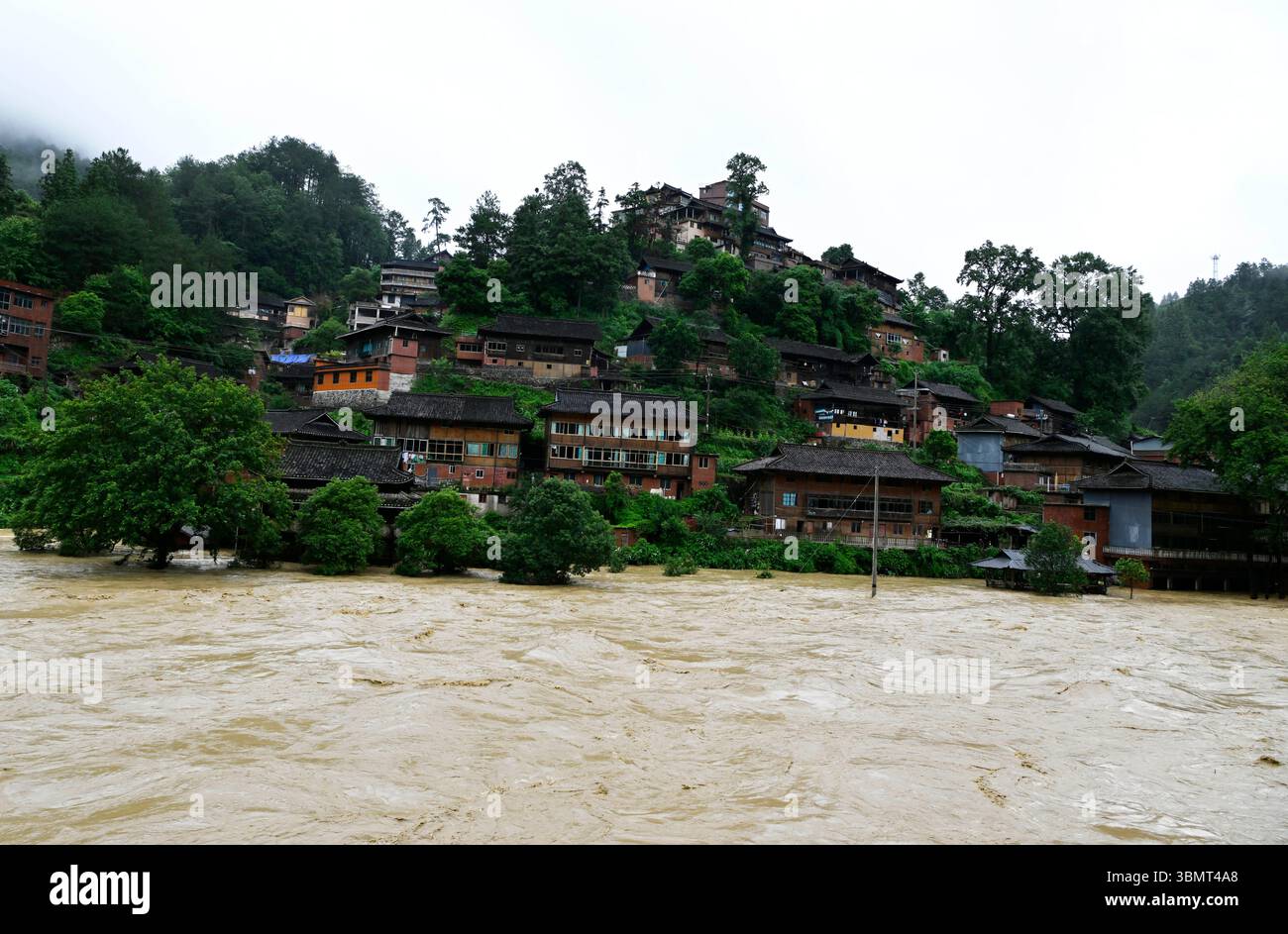 QIANDONGNAN, CHINA - JUNE 28, 2025 - The flood of the Bala River rose ...