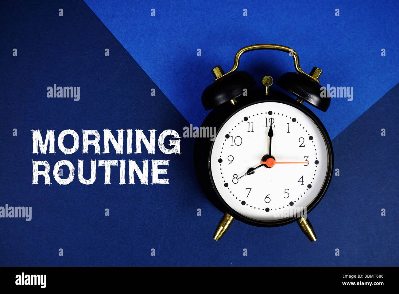 Morning Routine text with alarm clock on blue background Stock Photo ...