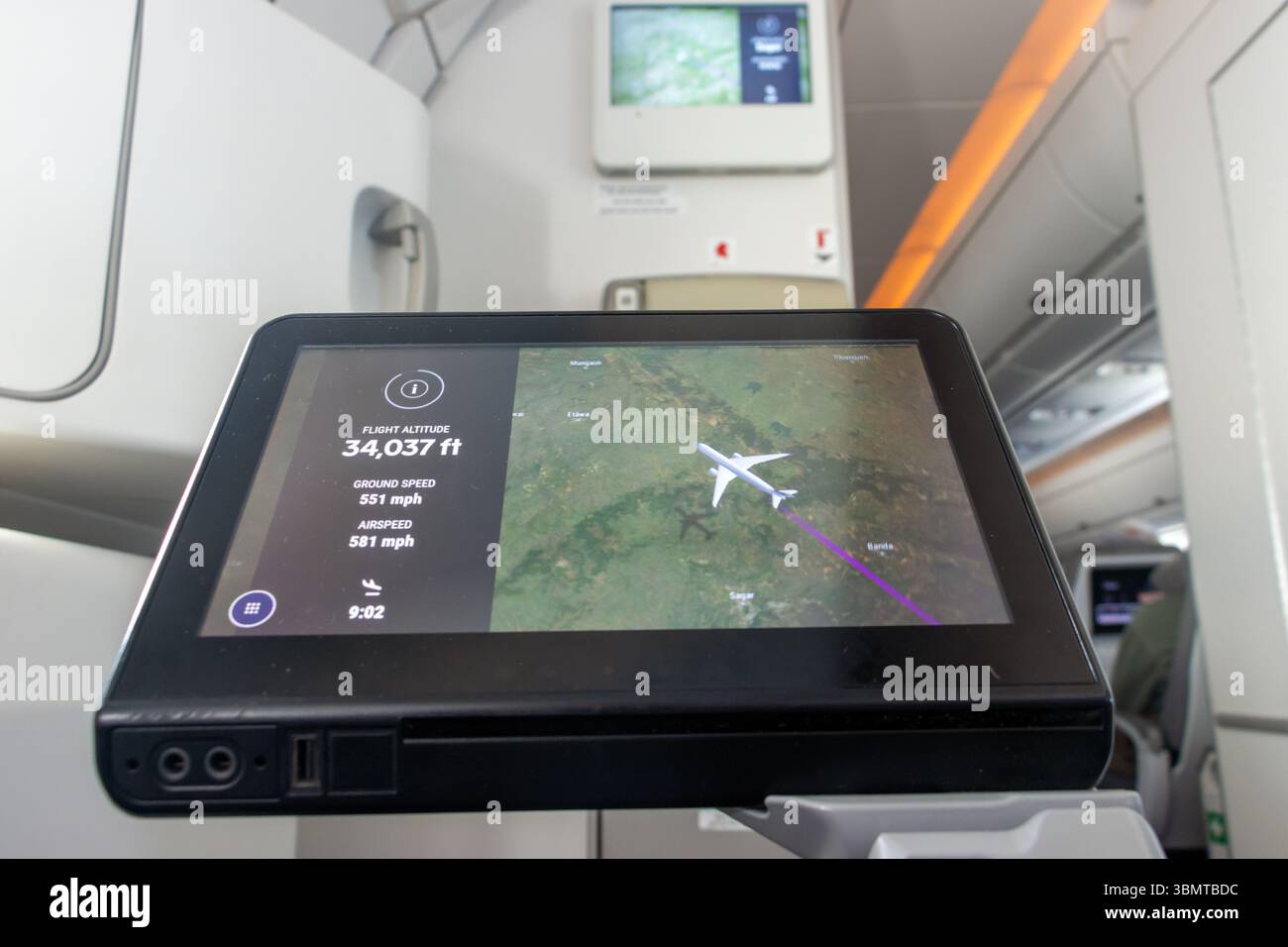 Route of flying plane on passenger monitor map Stock Photo - Alamy