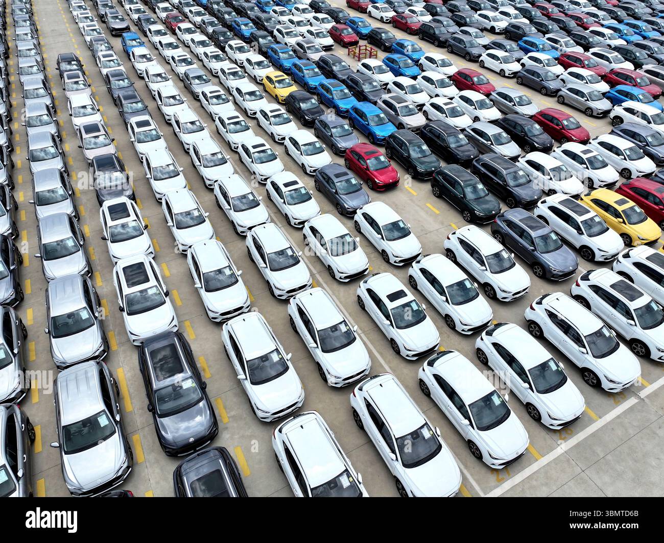 New cars waiting for shipment to overseas markets in a port in ...