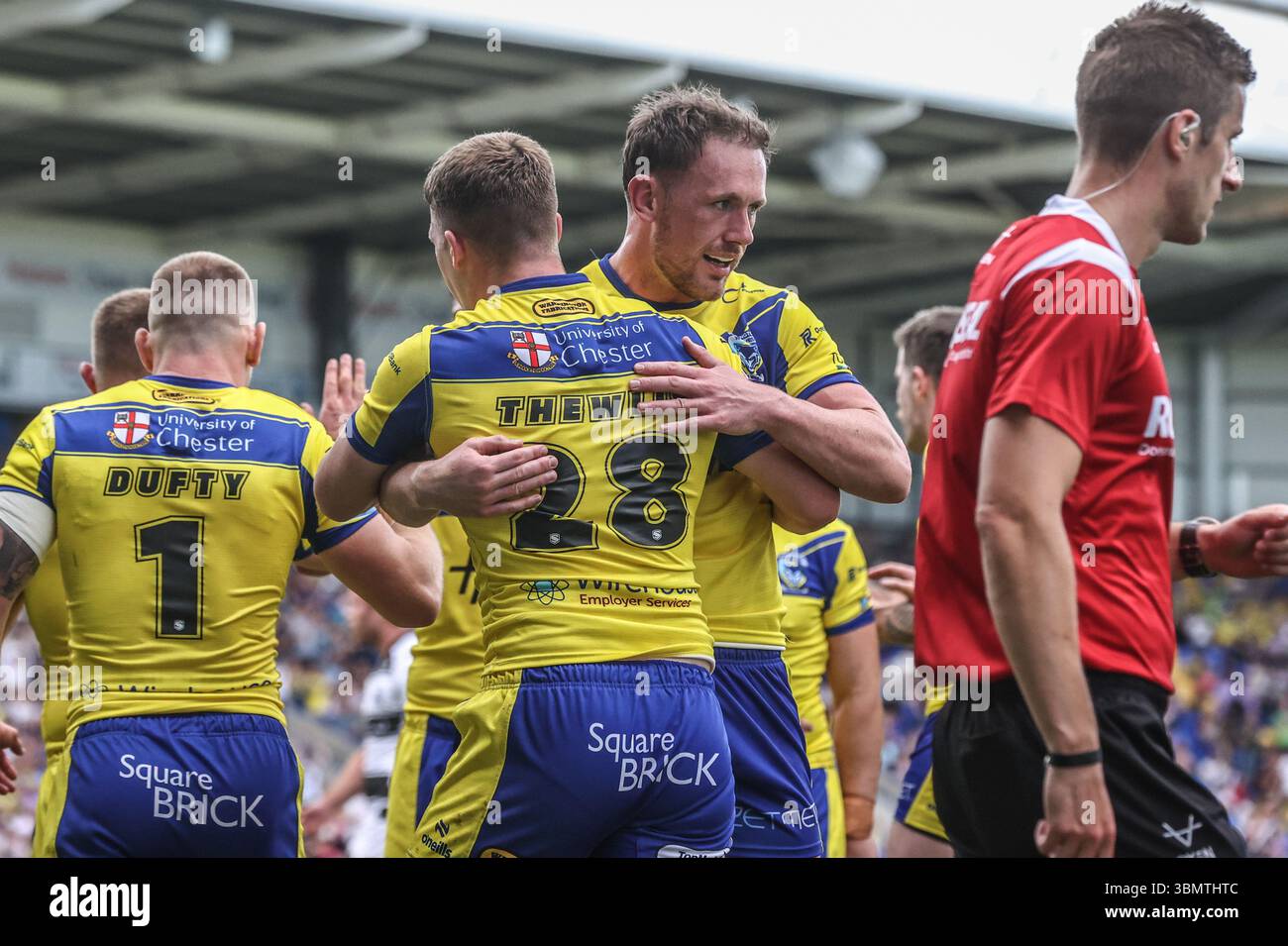 Jake Thewlis of Warrington Wolves celebrates his try during the Betfred ...