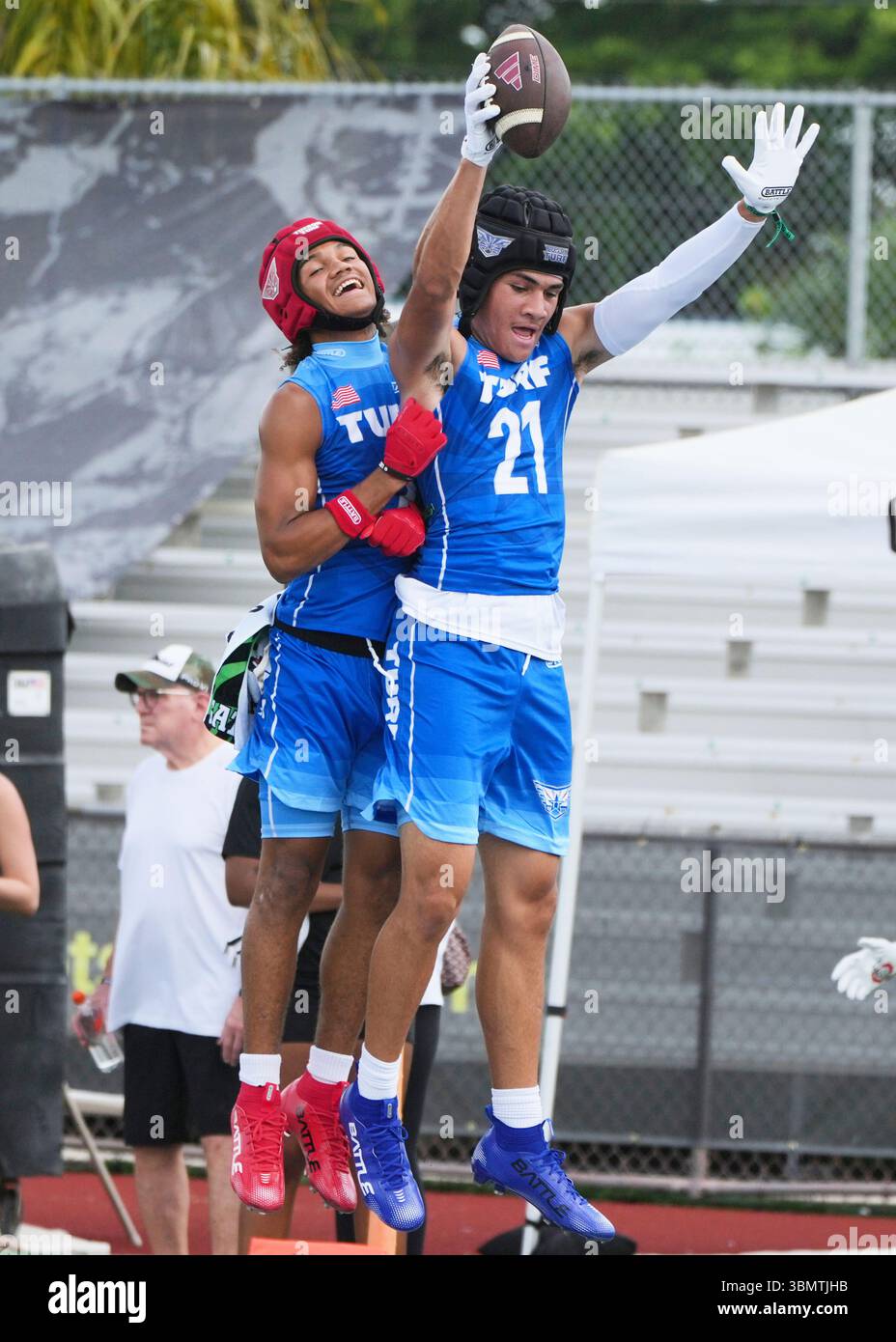 Tucson Turf's Dennis Tuaone (21) celebrates with Sean Roebuck, left ...