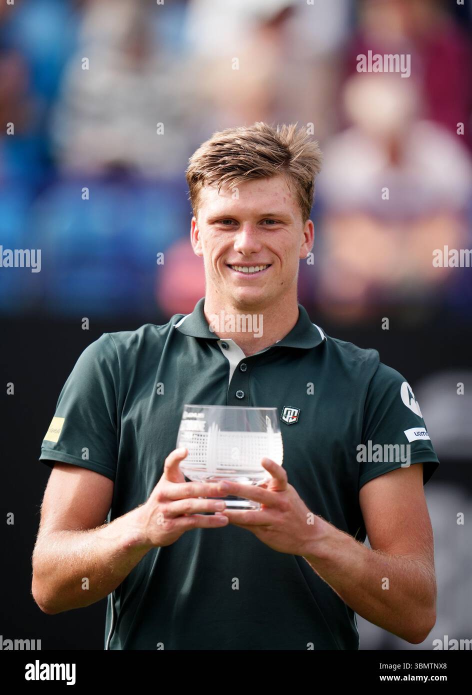 Jenson Brooksby with the Runners up trophy after the Men's single's ...