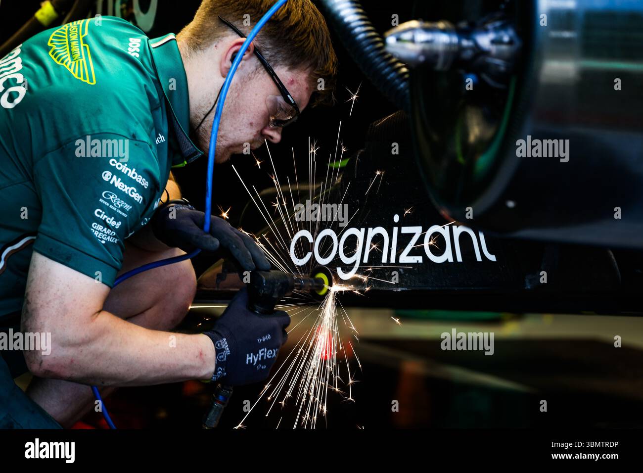 Aston Martin F1 Team AMR25, mechanical detail of mechanic working on ...
