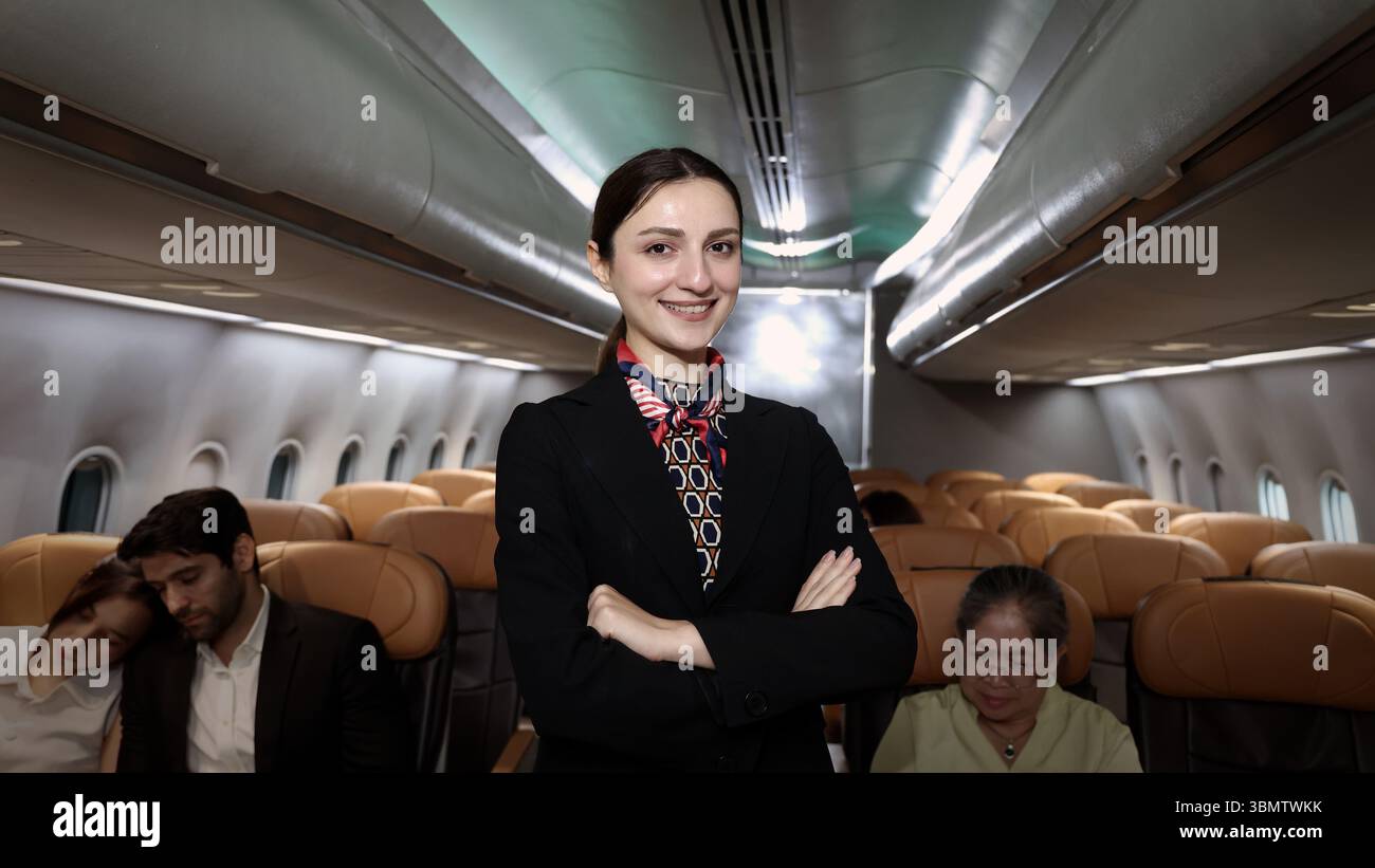 Air hostess. Smiling flight attendant in uniform welcomes and guides ...