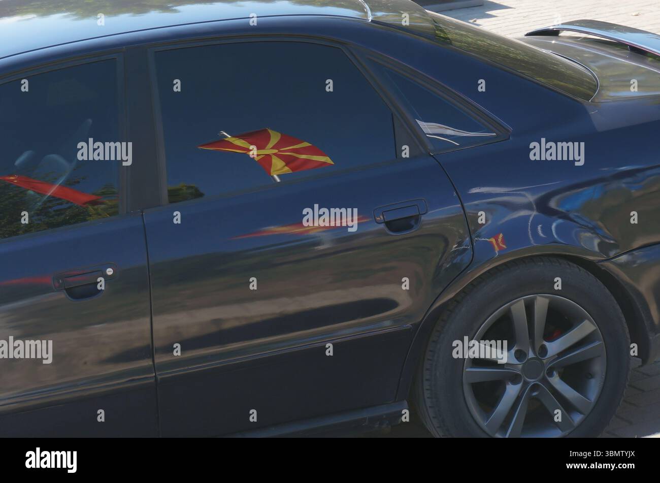 Reflection of National flag in car glass. Struga, Macedonia Stock Photo ...