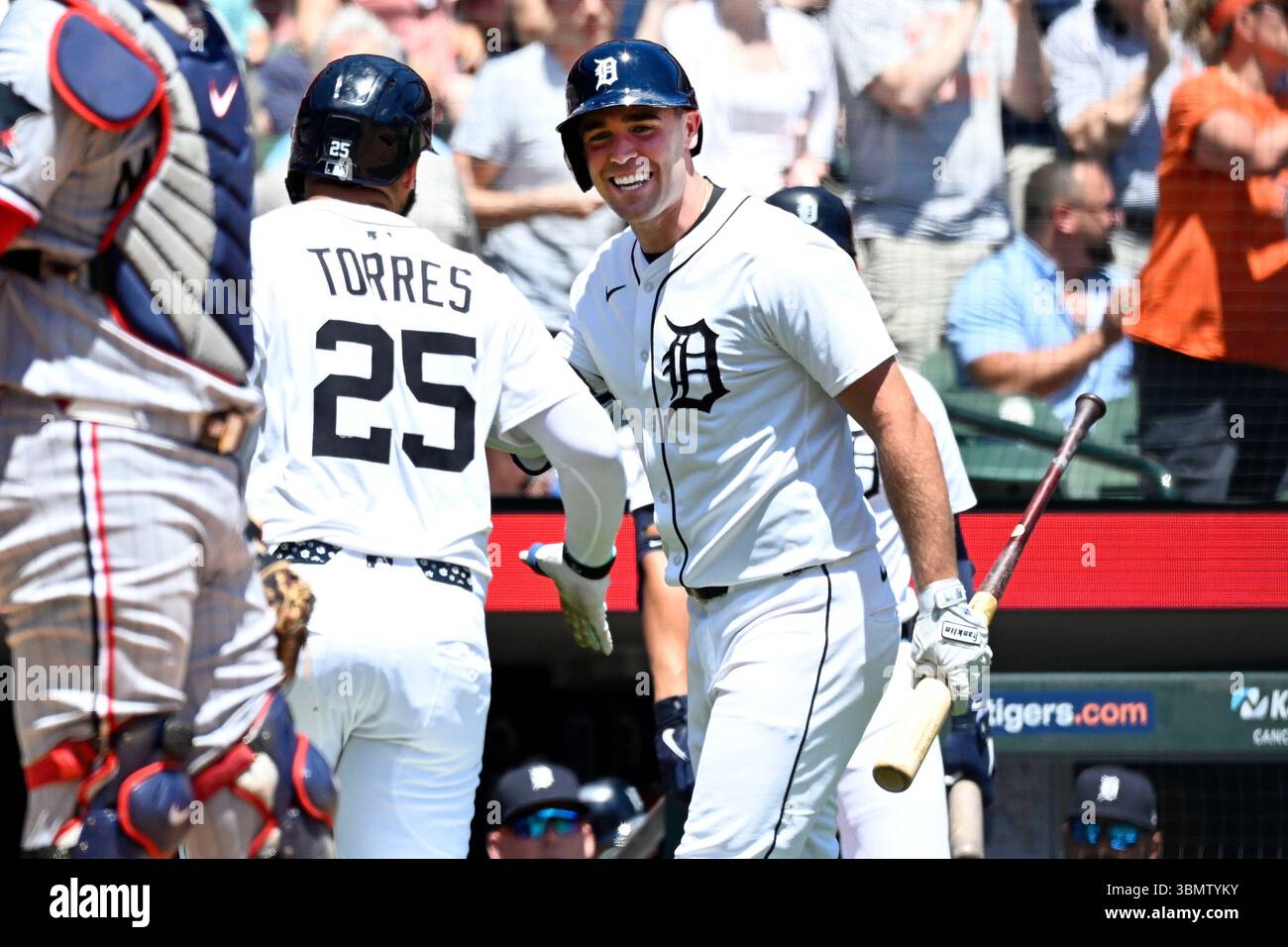 Detroit Tigers' Gleyber Torres (25) is congratulated by Kerry Carpenter ...