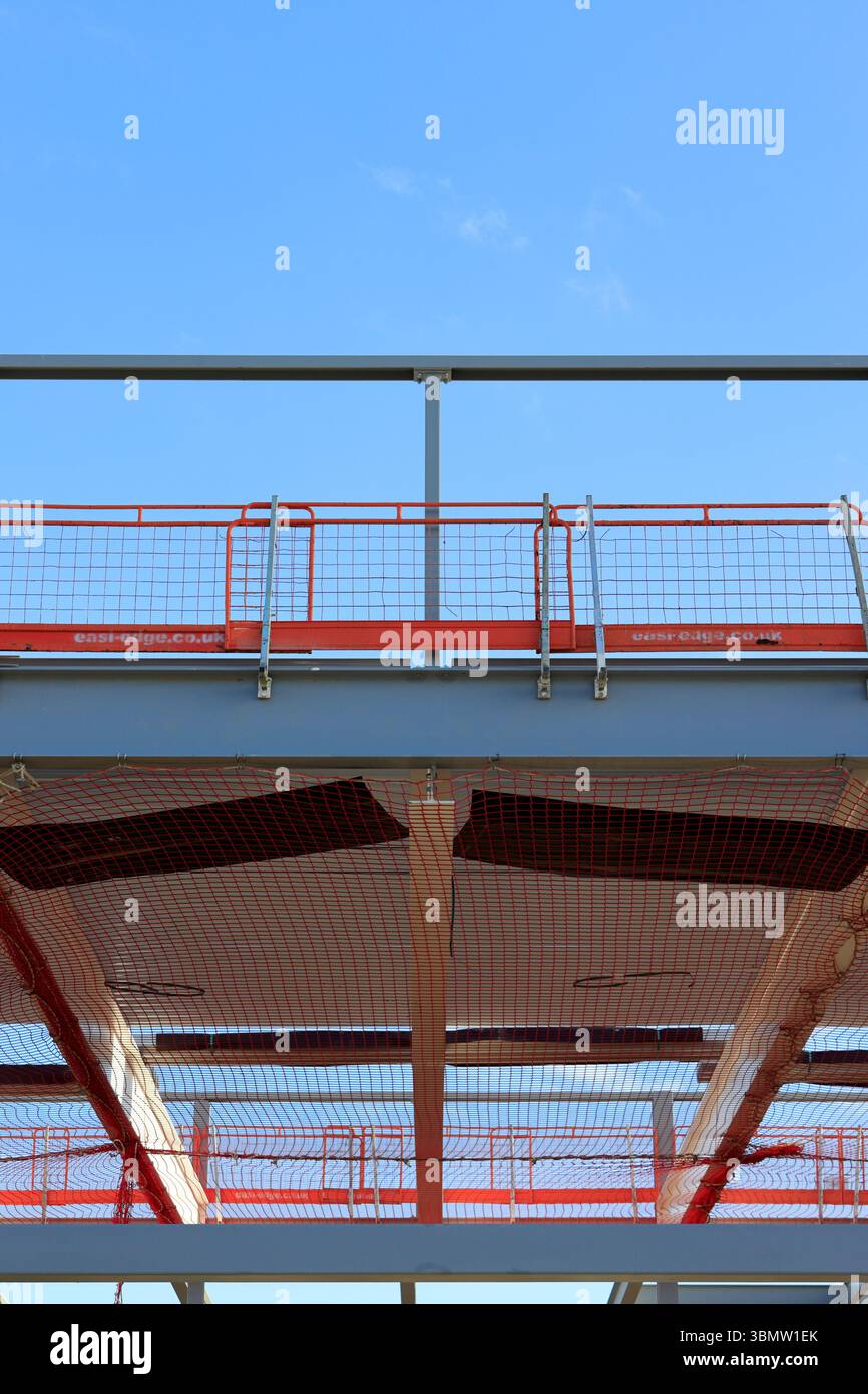 Steel skeleton frame steelwork with fall arrest safety netting at ...