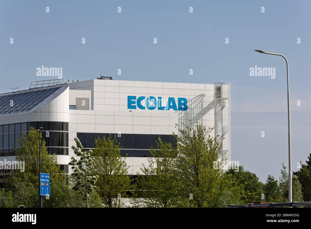 The Ecolab building, a prominent and modern facility, stands under a ...