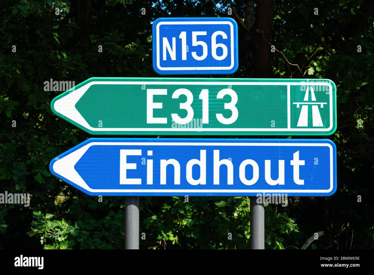 Green and blue Belgian road sign to the highway E 313 and national ...
