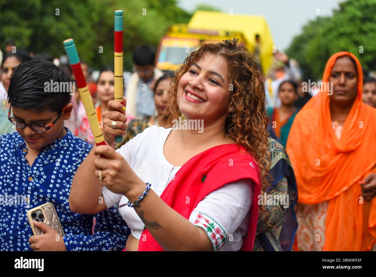 GURUGRAM, INDIA - JUNE 27: Devotees pull chariot of Lord Jagannath, Lord Balabhadra and Goddess ...