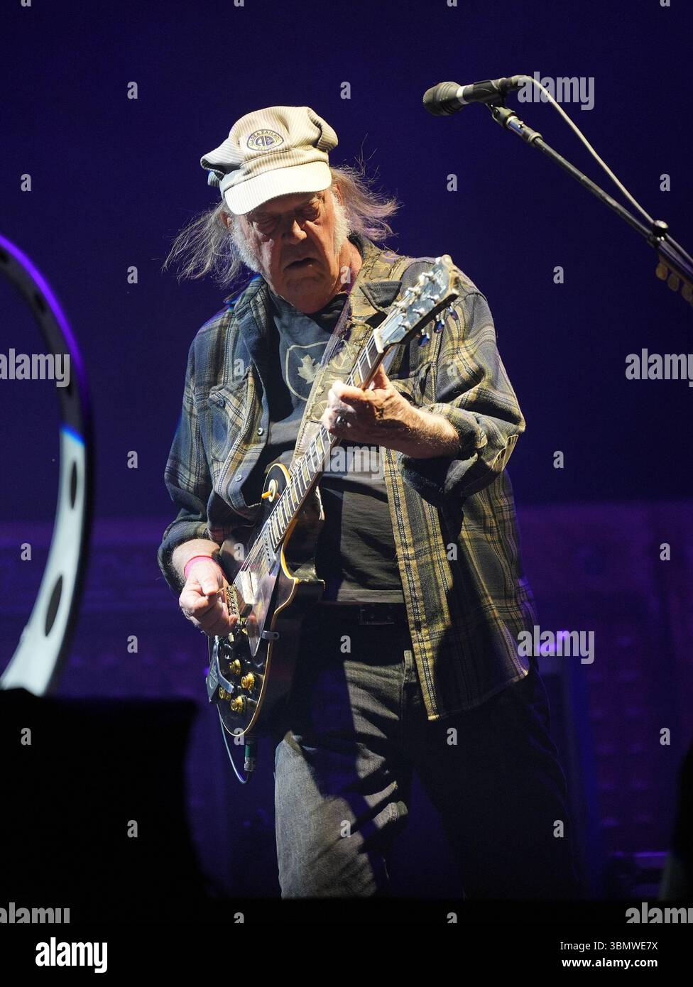 Neil Young performing on the Pyramid Stage during the Glastonbury ...