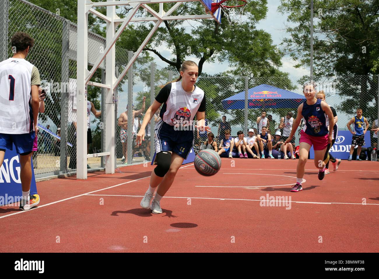 Wom?n basketball players seen in action during the Red Bull Half Court ...