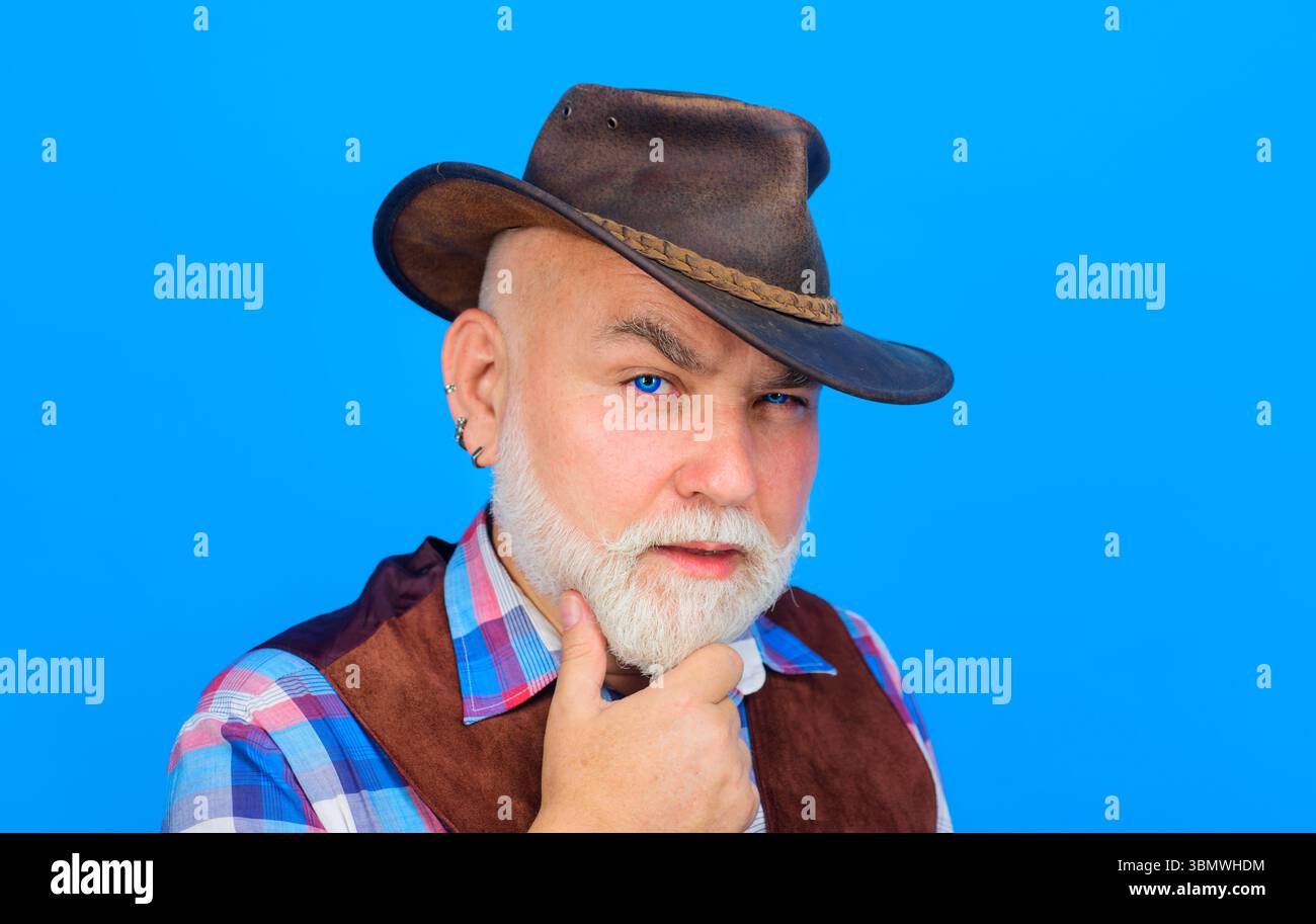 Leather cowboy hat. Portrait of bearded man in cowboy hat. Cowboys in ...