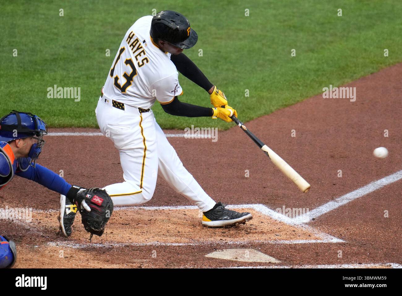 Pittsburgh Pirates' Ke'Bryan Hayes (13) singles off New York Mets ...