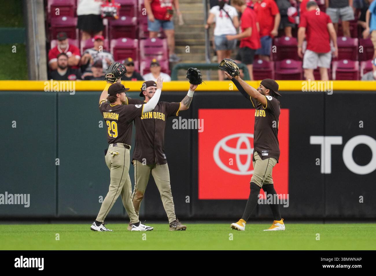 San Diego Padres' Bryce Johnson (29), Jackson Merrill, center, and ...