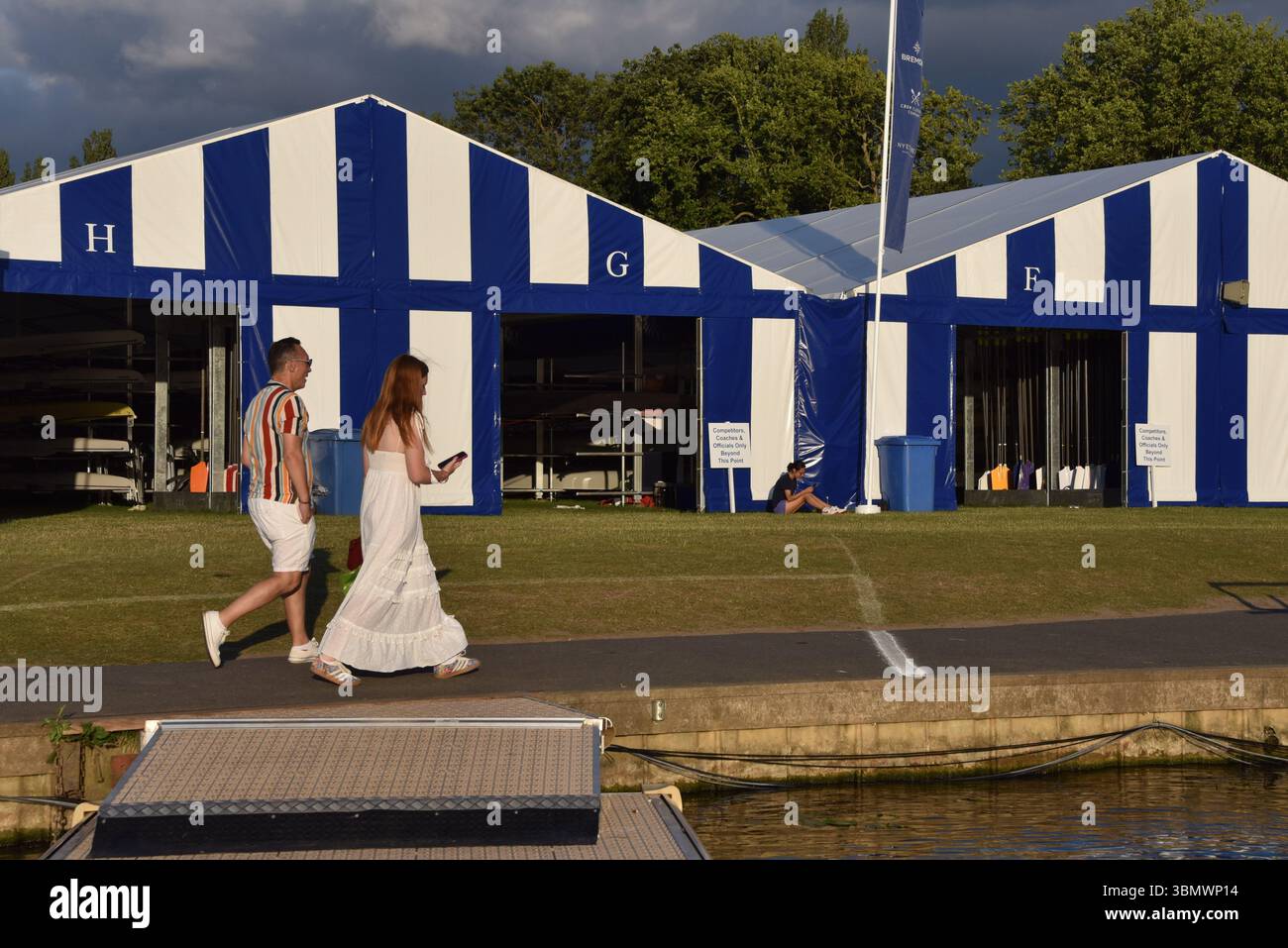 Henley-on-Thames, Oxfordshire, UK, 29th June 2025. A couple walk past ...
