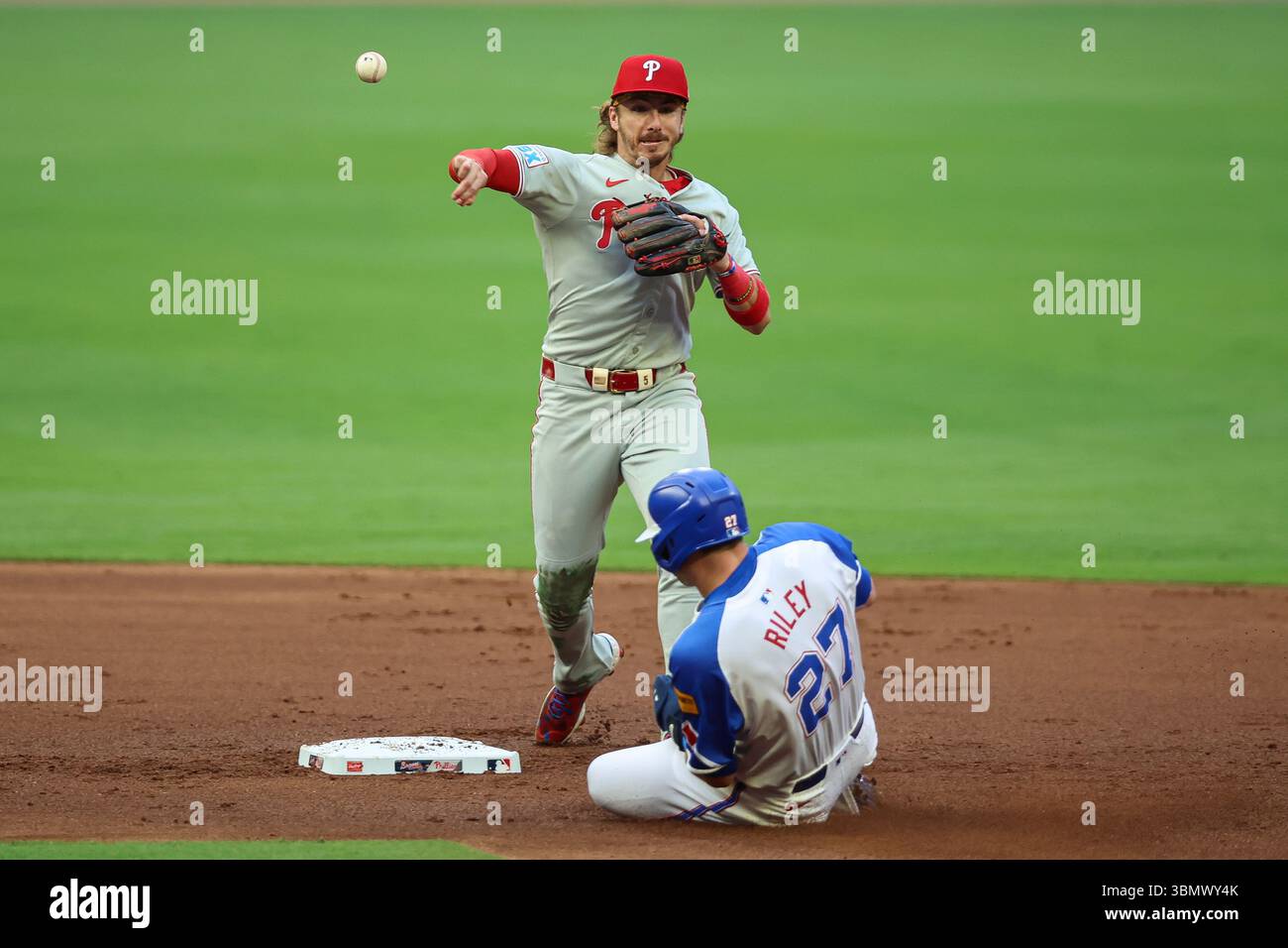 Philadelphia Phillies second baseman Bryson Stott throws to first base ...