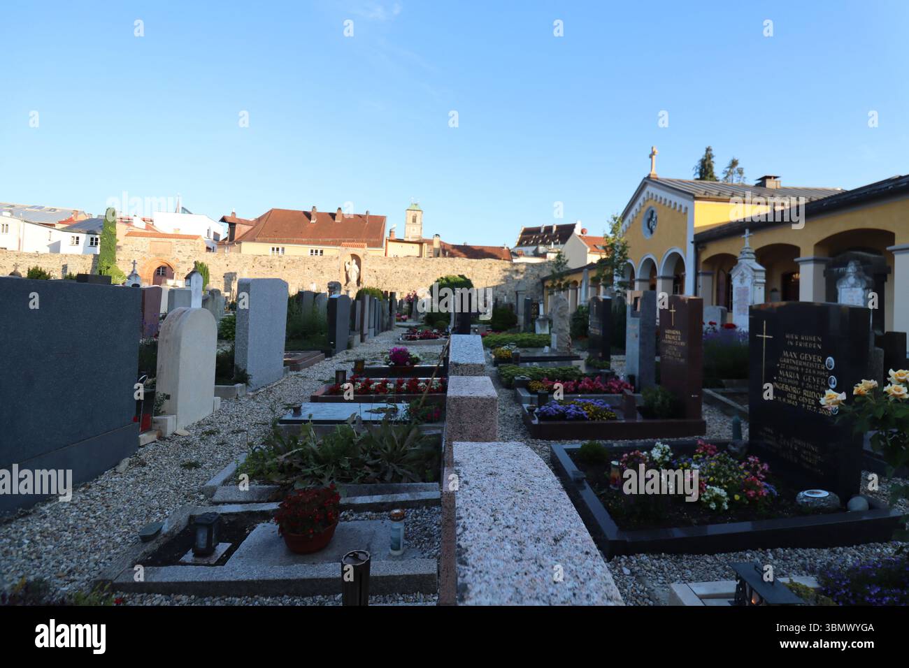 WASSERBURG AM INN, GERMANY - JUNE 20, 2025: Catholic cemetery with ...