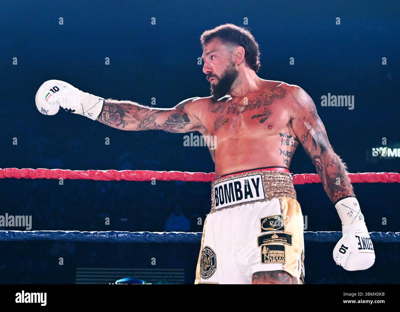 Hubert Poulin reacts after knocking out Dany Mallette during their ...
