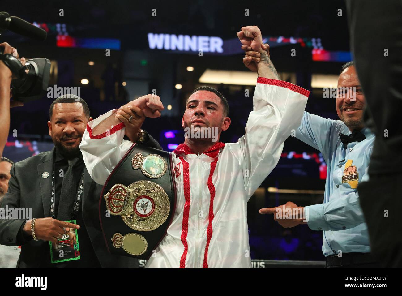 Julian Rodriguez poses with his belt after he knocked out Avious ...