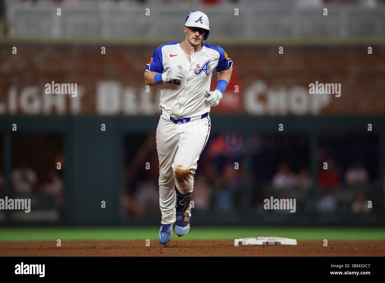 Atlanta Braves' Sean Murphy (12) rounds second base after hitting a ...