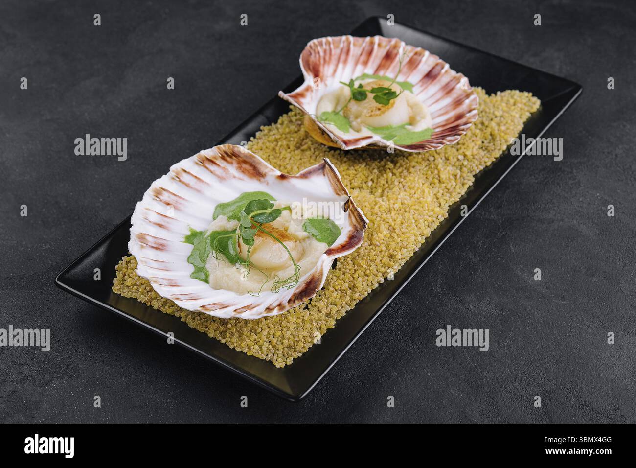 food still-life, Fried seafood scallops meat with butter in a shells ...