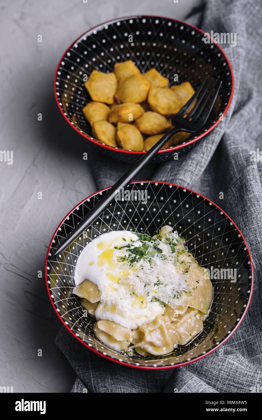 food still-life, Fried and boiled dumplings on stone Stock Photo - Alamy