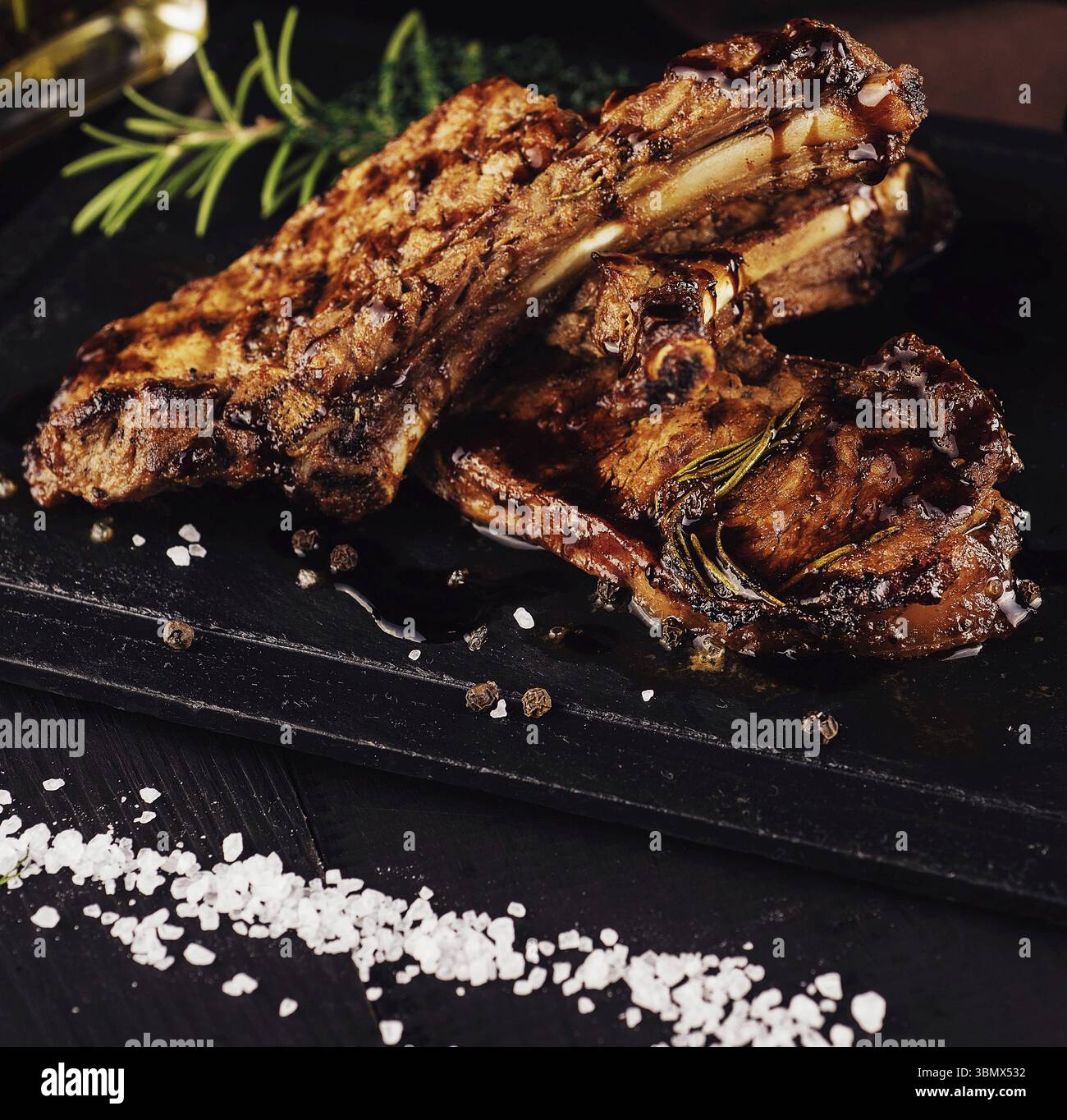 food still-life, Grilled and barbecue ribs pork on black Stock Photo ...
