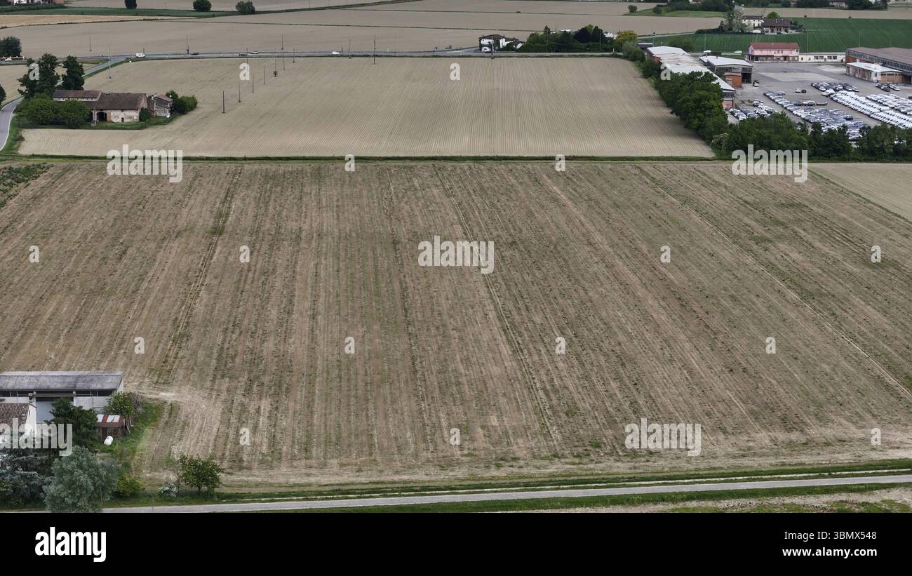 Expansive Farm Fields in the Italian Countryside Stretching Toward the ...