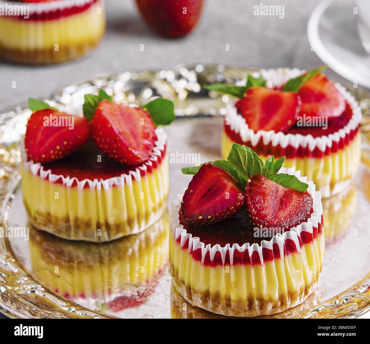 food still-life, Mini strawberry cheesecake in muffin forms Stock Photo ...