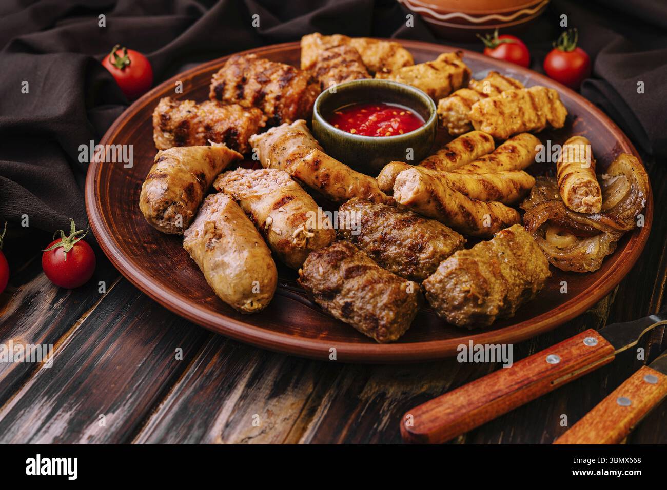 food still-life, Assorted barbecue of meat rolls or mici Stock Photo ...