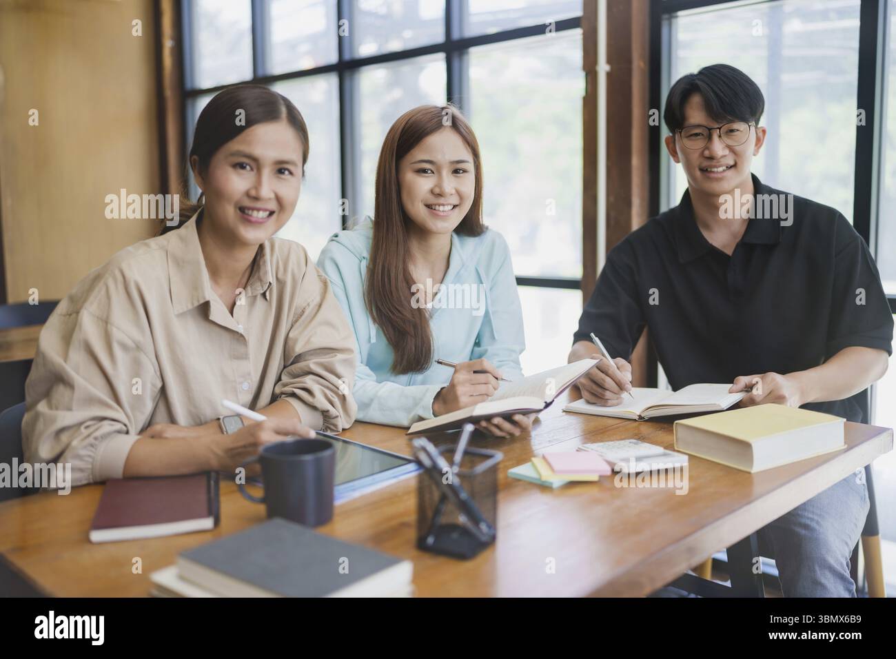 Asian student girl High School Tutor Individual Tuition From Teacher In Library. University ...