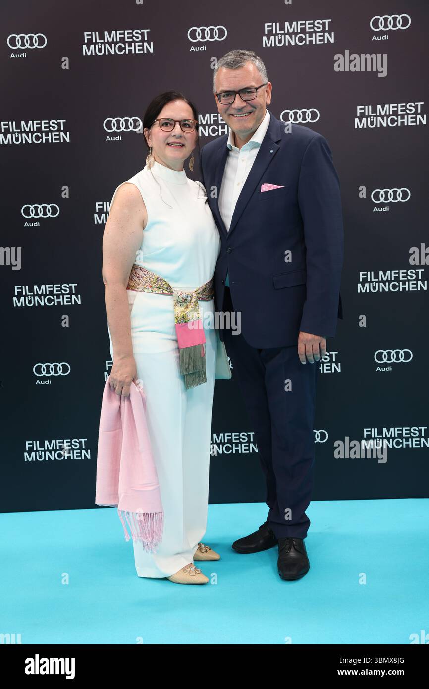 Munich, Germany. 28th June, 2025. Florian Herrmann (CSU) and his wife ...