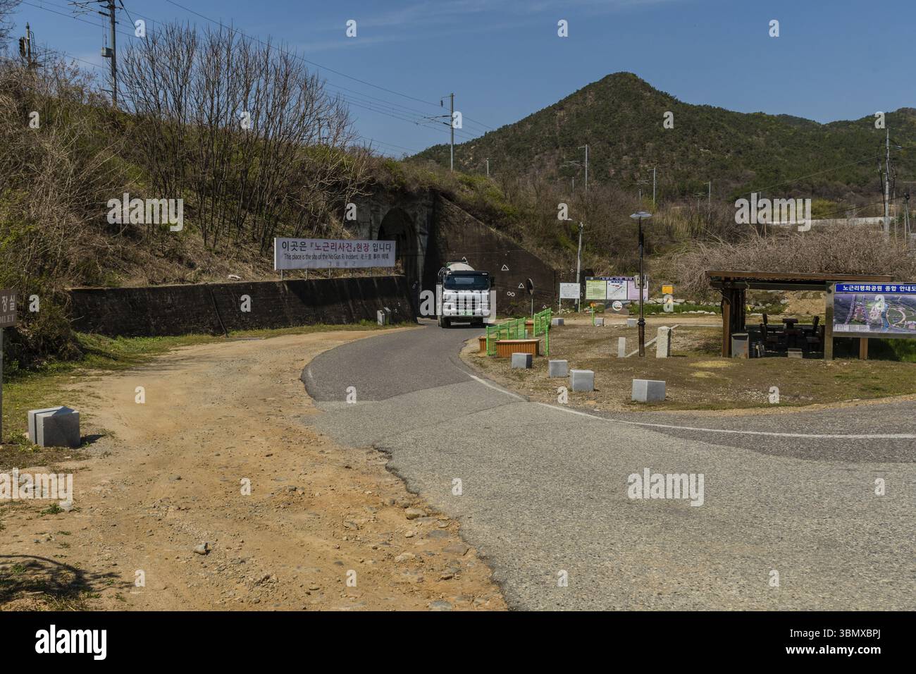 Hwanggan, South Korea. April 14, 2020: Cement mixer driving on one lane ...