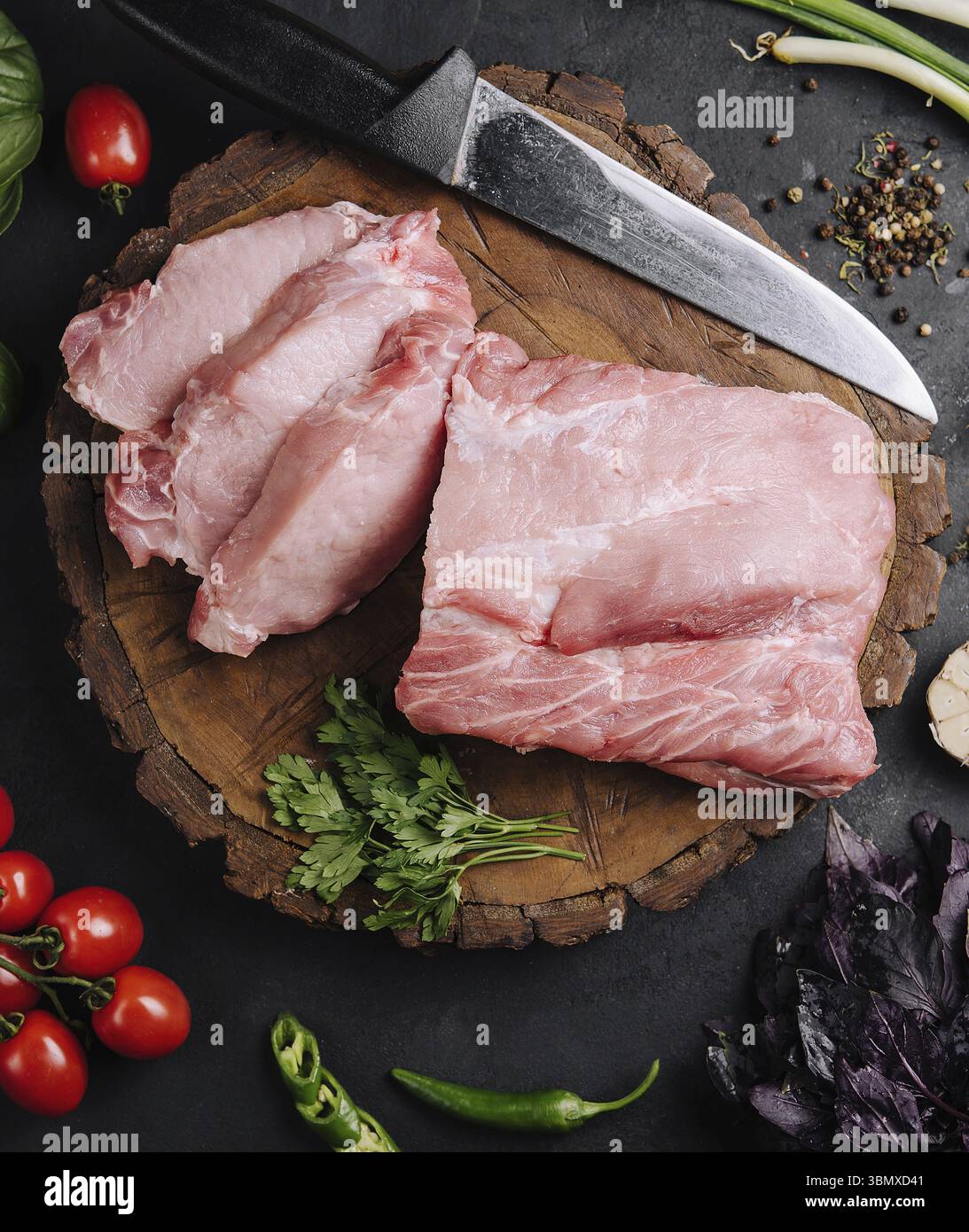 food still-life, Raw pork neck meat cuts with spices Stock Photo - Alamy