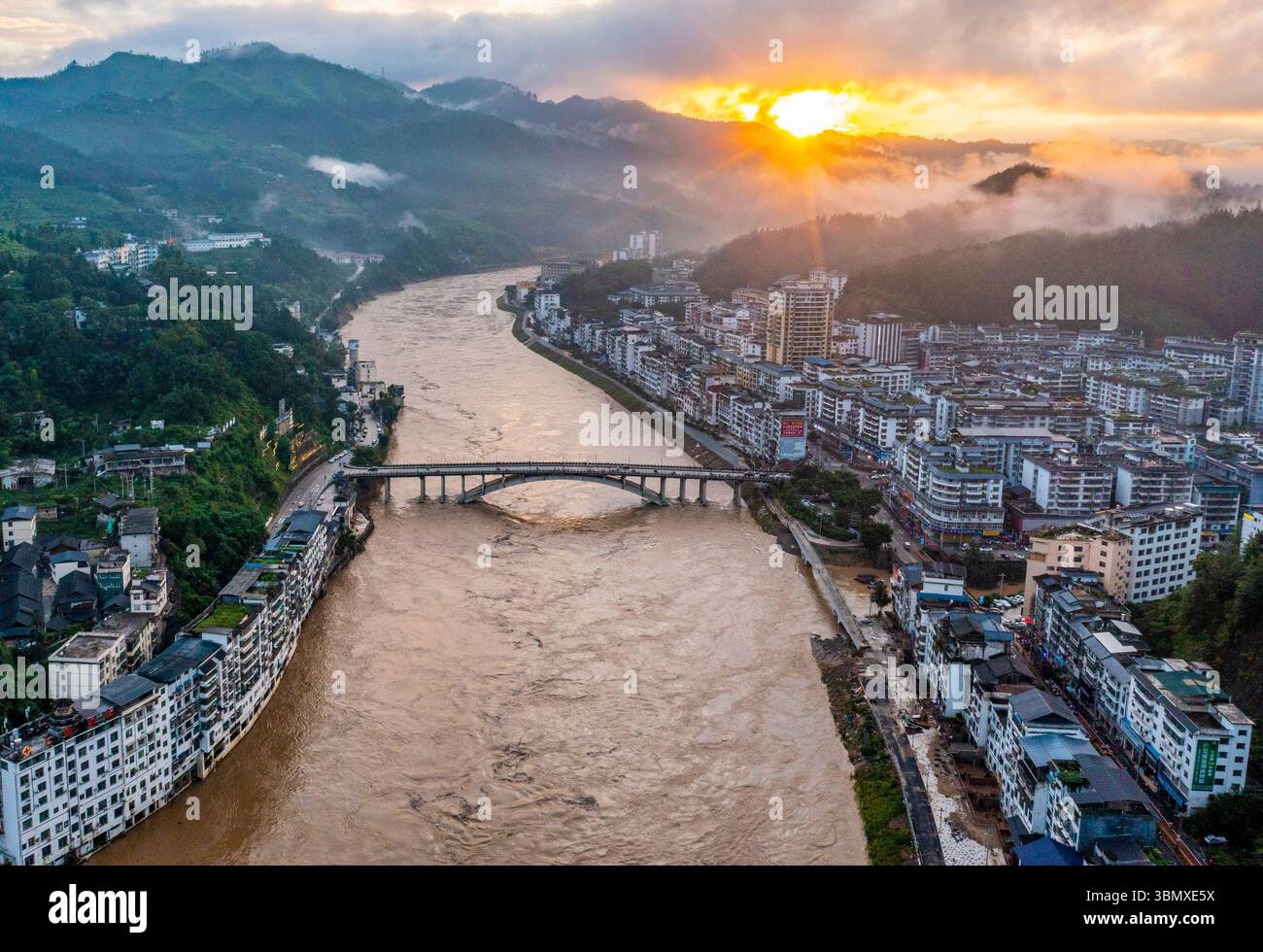 The scene of floodwaters flowing through Congjiang County in Guizhou ...