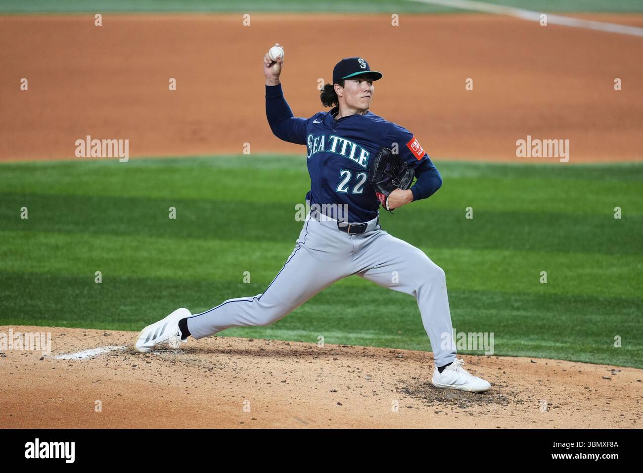 Seattle Mariners starting pitcher Bryan Woo throws to the Texas Rangers ...