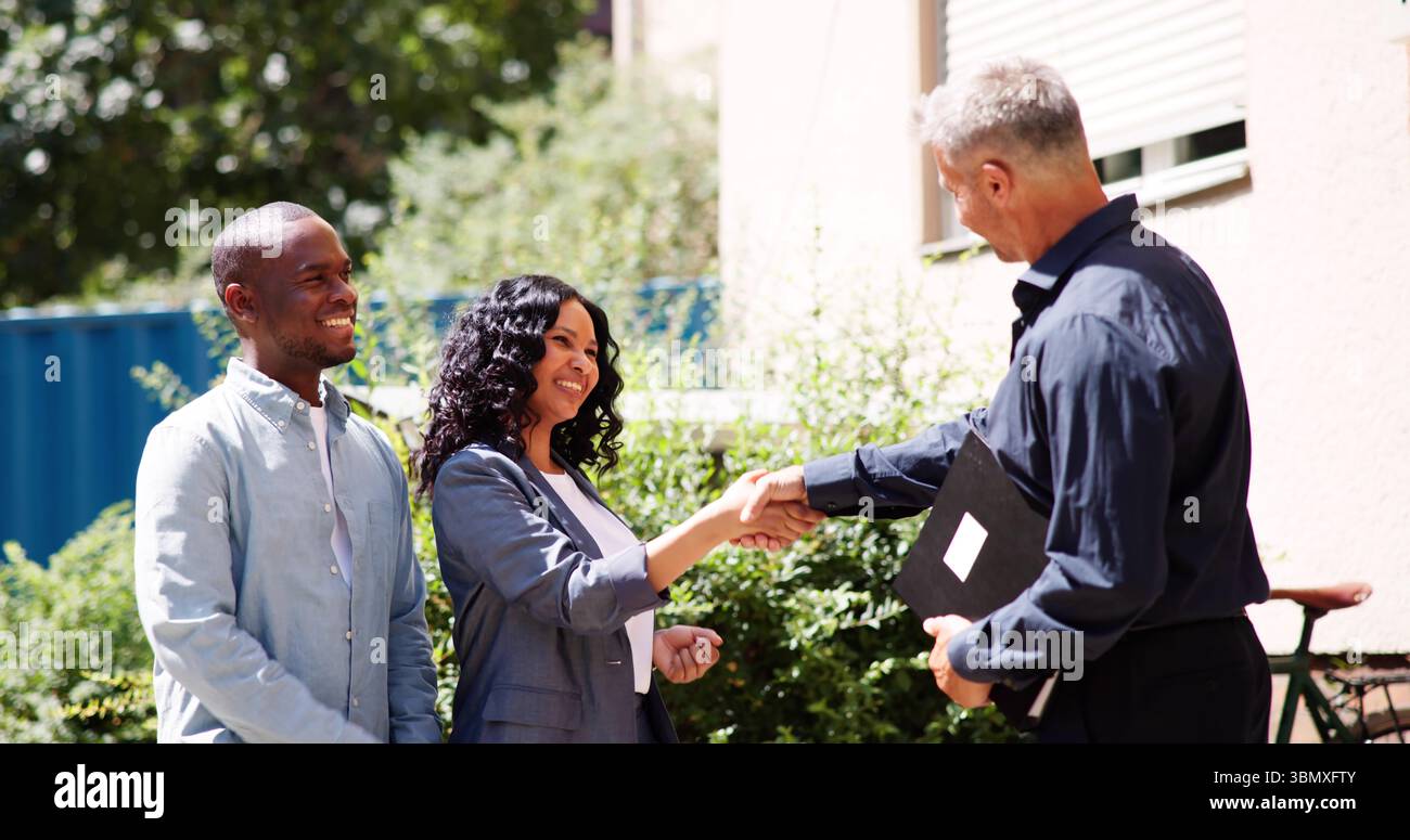 Handover Of Keys: Young Couple Closing On New House Stock Photo - Alamy