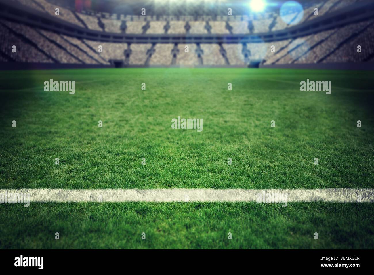 Empty soccer grass field is being shown under stadium seating tiers and ...