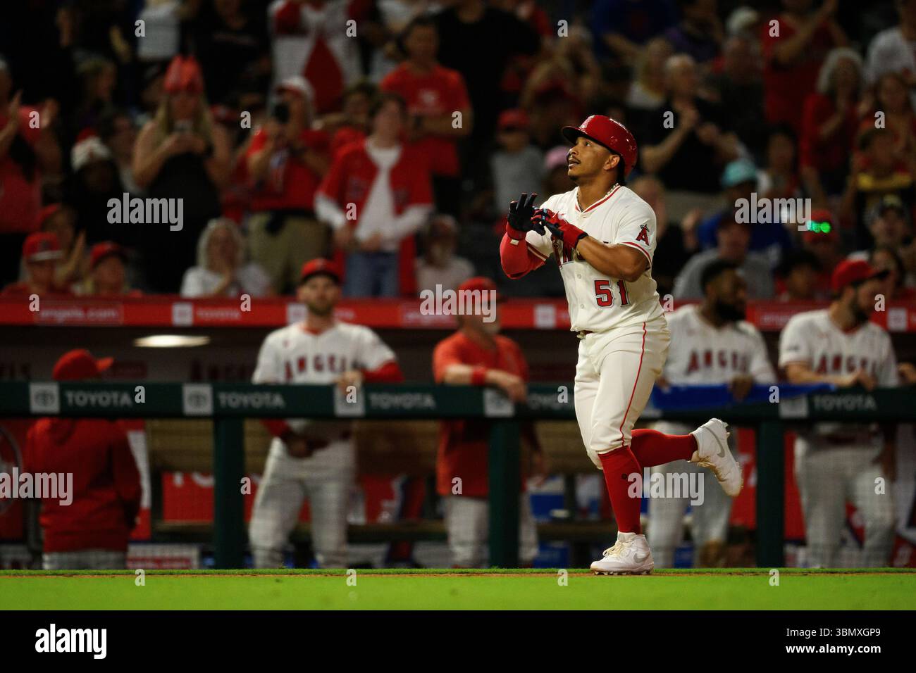 Los Angeles Angels' Gustavo Campero gestures after hitting a home run ...