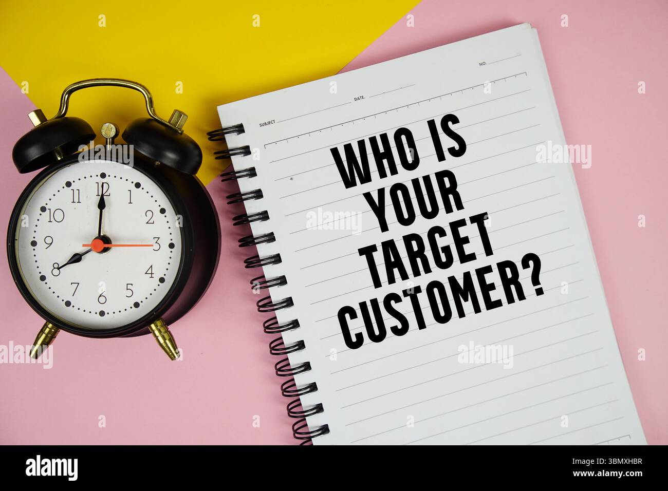 Who Is Your Target Customer? text written on notepad with alarm clock ...