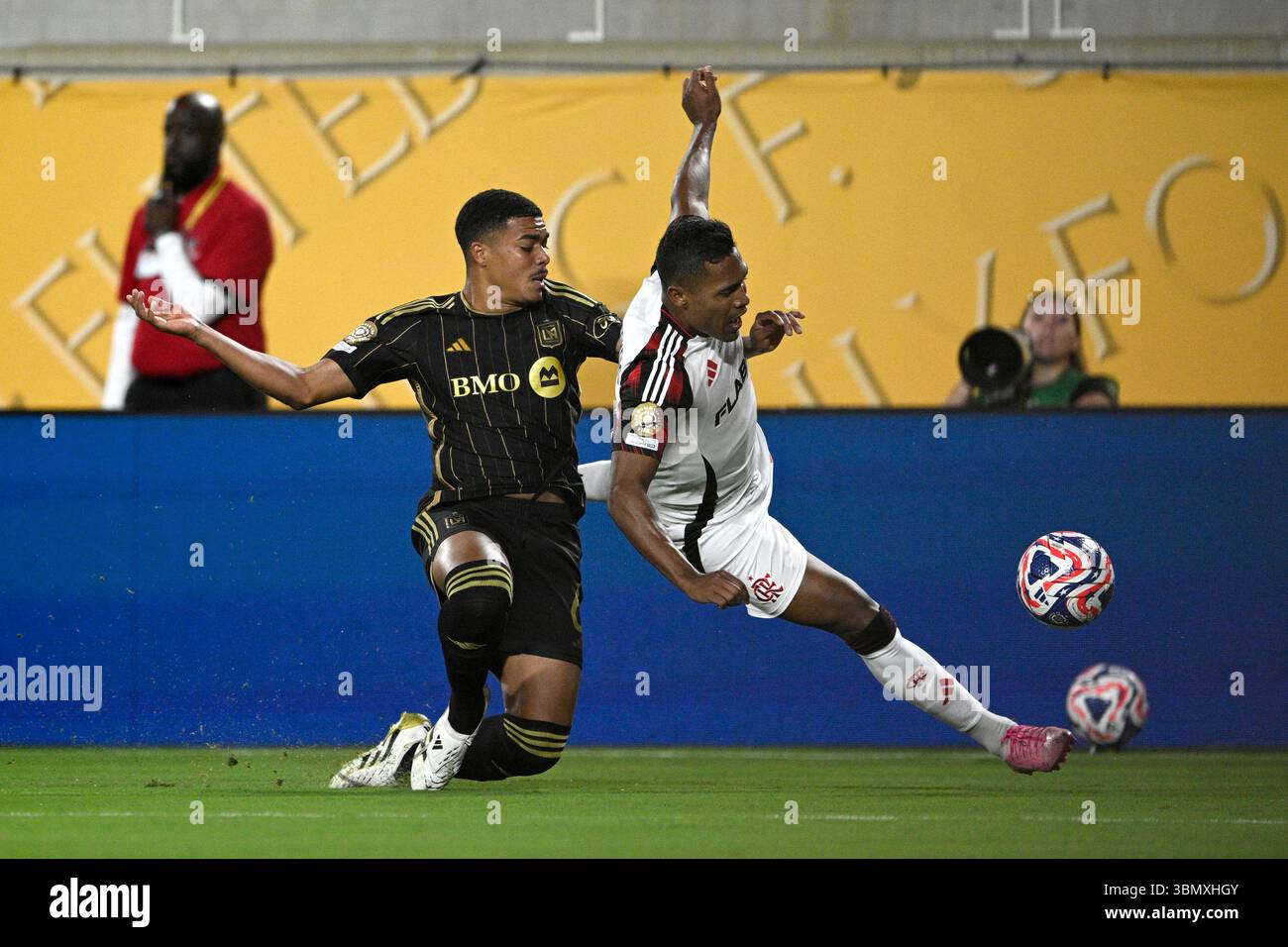 Los Angeles FC's Igor Jesus, left, and Flamengo's Alex Sandro compete ...