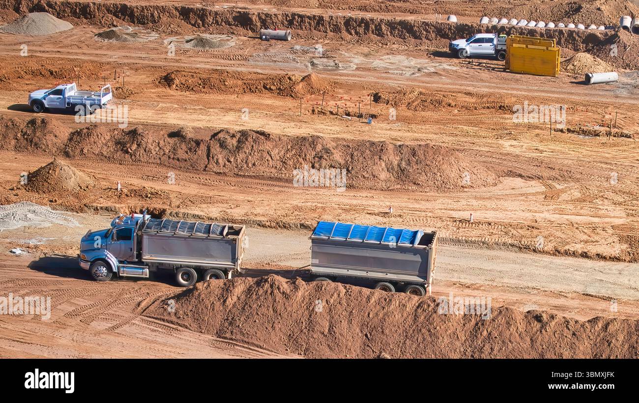 Truck and trailer and utes at large-scale construction and earthworks ...