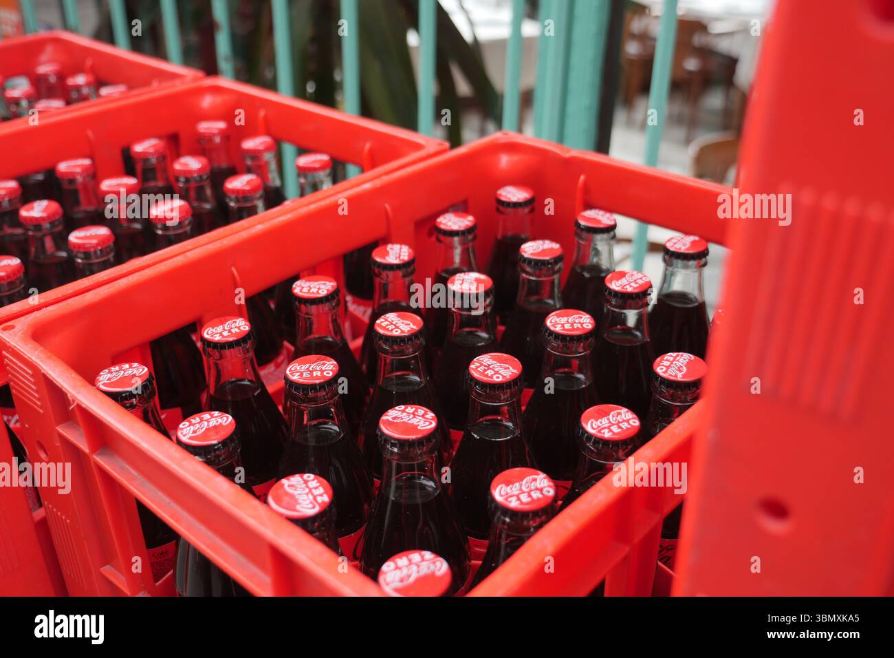 turkey istanbul 17 june 2025. Bottles of coke stacked in crates Stock ...