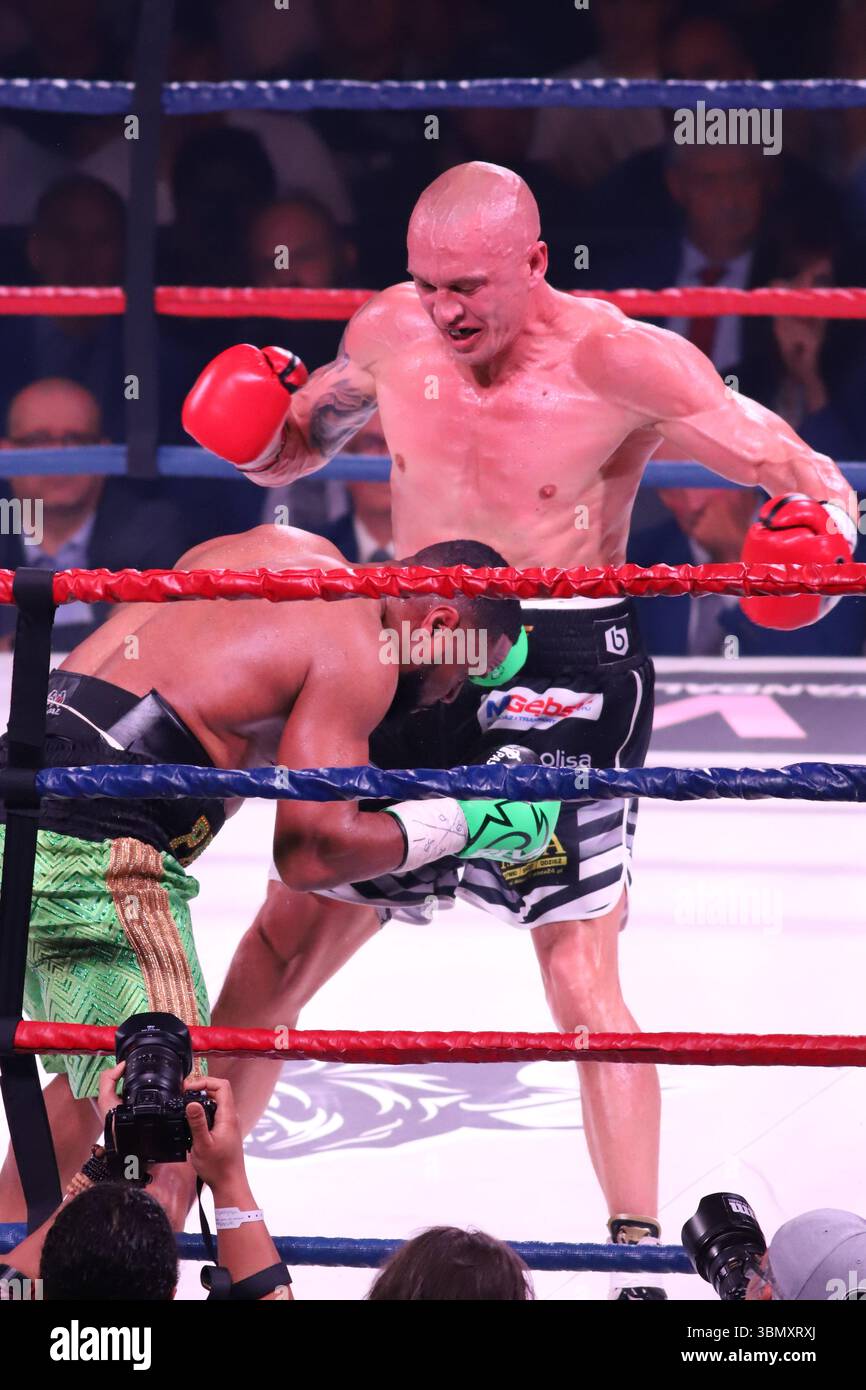 Laval, Canada. 28th June, 2025. Michal Cieslak punches Jean Pascal ...