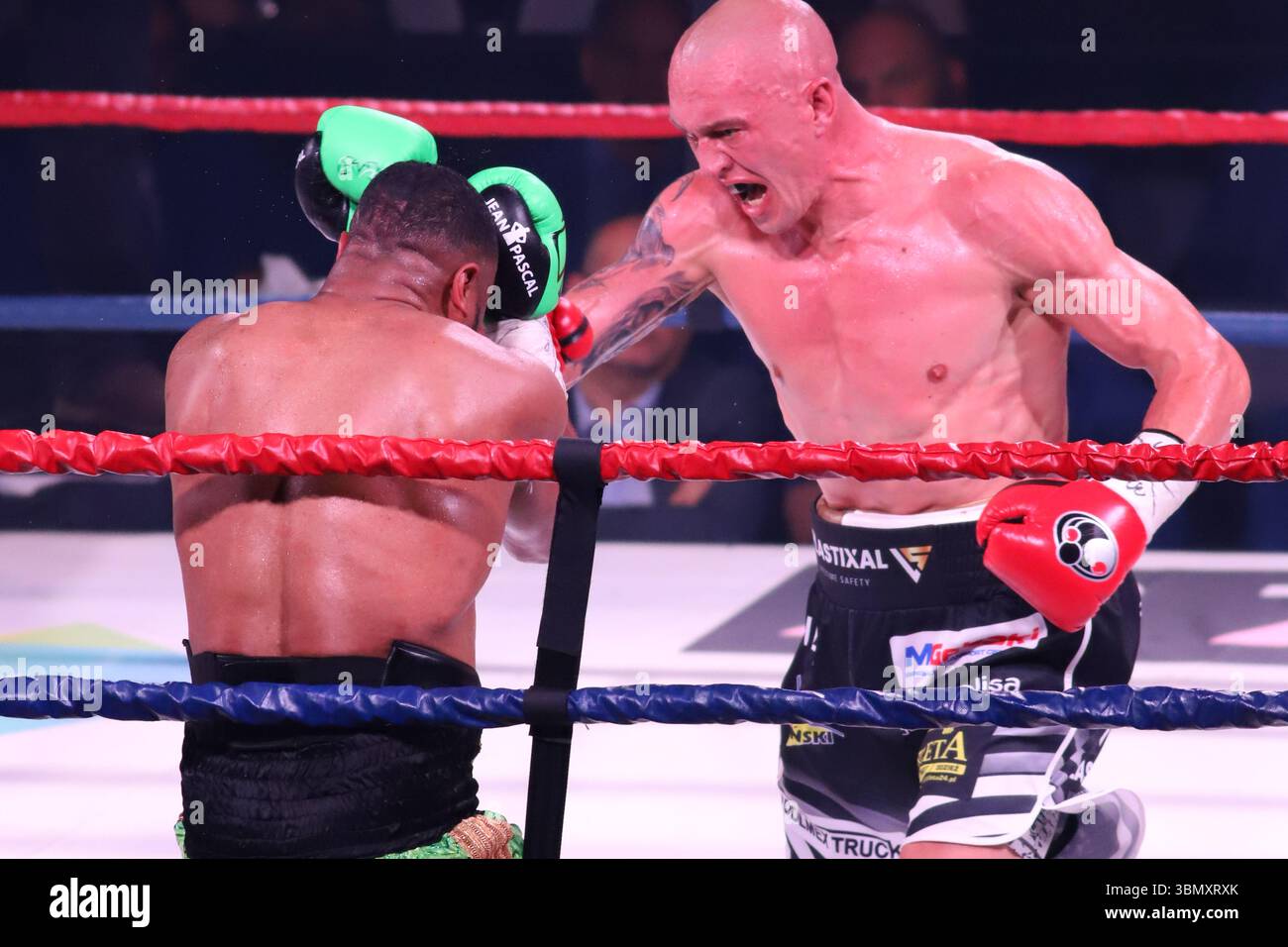 Laval, Canada. 28th June, 2025. Michal Cieslak punches Jean Pascal ...