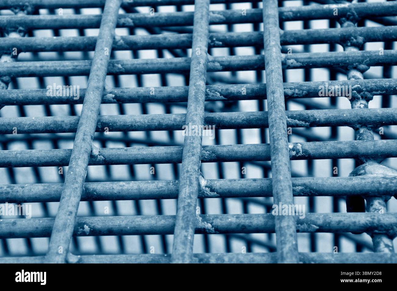 The pattern of a grate suitable for backgrounds Stock Photo - Alamy