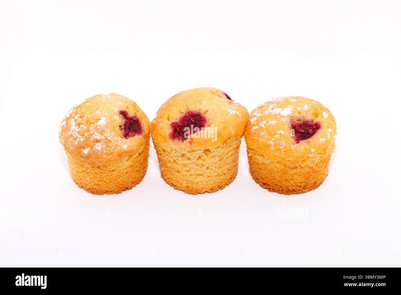 It is Three muffins isolated on white Stock Photo - Alamy